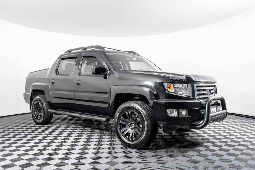 Lifted Silver Honda Ridgeline